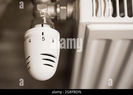 Closeup photo of a heating radiator with temperature regulator Stock ...