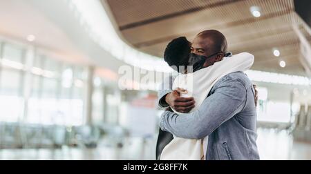 A man giving a woman a big hug - lifting her off the ground Stock Photo ...