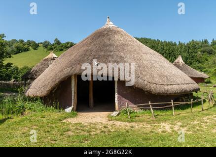 Iron age roundhouses reconstructed at Butser Ancient Farm archeological ...