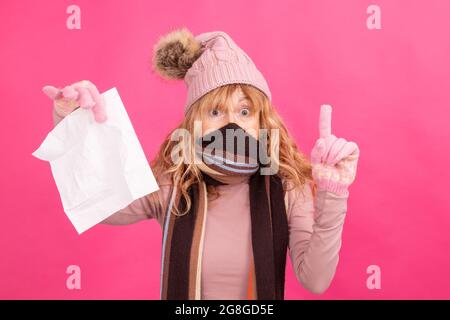 snug woman warm with scarf and kerchief isolated Stock Photo - Alamy