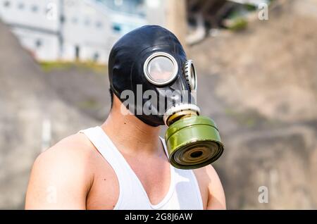 A muscular man in a gas mask Stock Photo - Alamy
