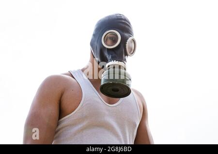 A muscular man in a gas mask Stock Photo - Alamy