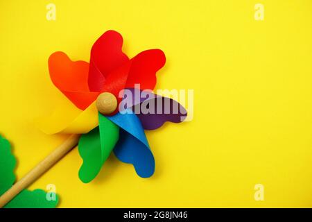 colorful pinwheel with space copy isolated on orange background Stock ...