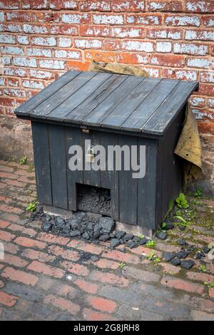 Old fashioned coalbunker or coal house outside a working class house ...