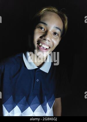 Handsome Filipino Male Laughing Stock Photo - Alamy
