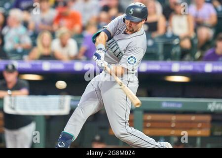 Seattle Mariners catcher Cal Raleigh, left, and relief pitcher Matt ...