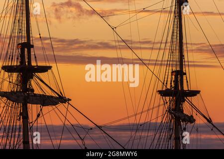 ship's mast at sunset pink orange navigation.concept discoverers of ...