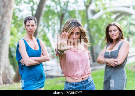 Mature woman making X sign with crossed hands, gesturing stop, warning ...