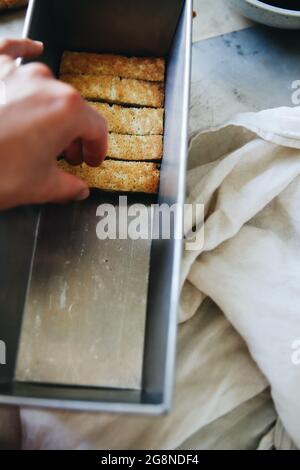 Deep oven-tray with fresh tiramisu flavored with cocoa Stock Photo - Alamy