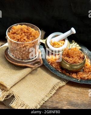Shrimp paste with Dried shrimps in white Ceramic Bowl on Wooden plank ...