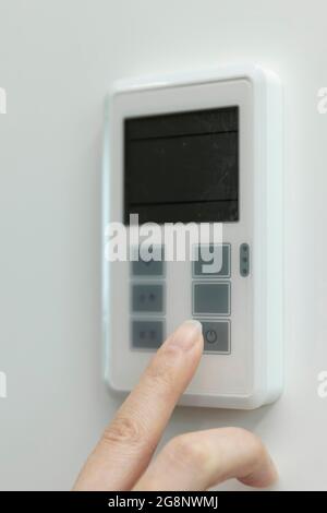 hand checking power consumption rate Stock Photo - Alamy
