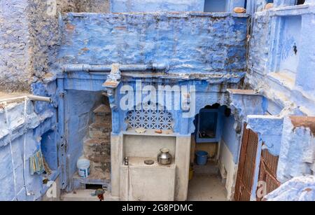 JODHPUR, RAJASTHAN, INDIA - JULY 2021: The bright blue color street and ...