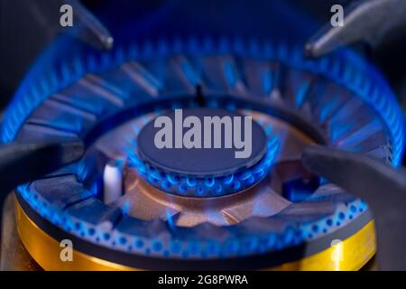 Open the gas valve and put the pot on the stove Stock Photo - Alamy