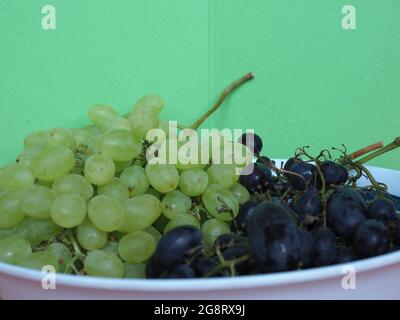 white and red grape (scientific name Vitis vinifera) vegetarian fruit ...