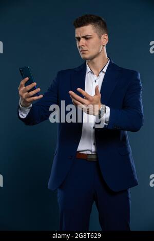 Express yourself. a handsome young man out in the city Stock Photo - Alamy