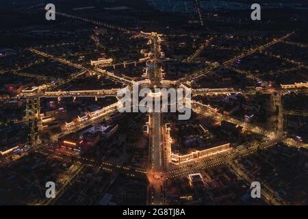 The cityscape of Turks Bagua City in China at dusk. Shot in Xinjiang ...