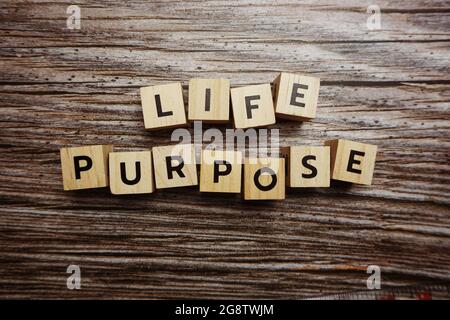 Life Purpose alphabet letters on wooden background Stock Photo - Alamy