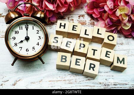 Happy September alphabet letters on wooden background Stock Photo - Alamy