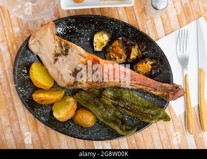 Lamb shoulder baked with new potatoes Stock Photo - Alamy
