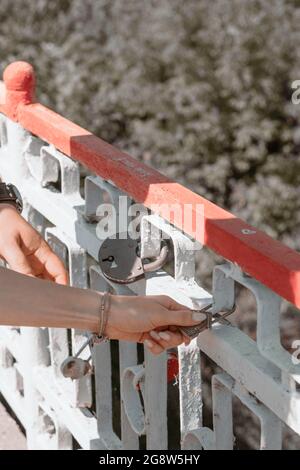 The bride and groom locks. Newlyweds hang the lock symbolizing ...