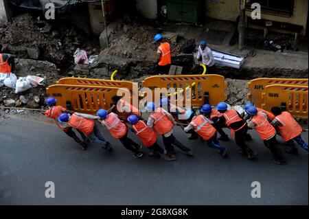 workers Pulling a fiber optic cable for fast internet and telephone ...
