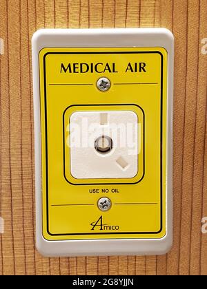 Close-up shot of the Amico medical air wall outlet with the company ...