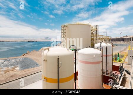 Desalination plant at port Punta Padrones with Caldera bay on de back ...