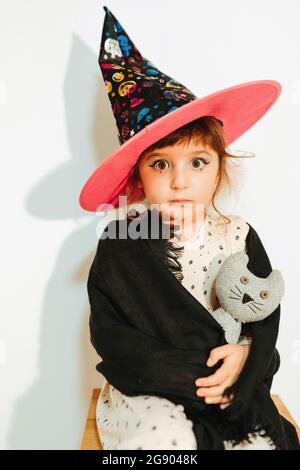 Image of scary witch girl in black halloween costume screaming and ...