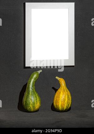 Small pumpkins with art frame in the background Stock Photo - Alamy