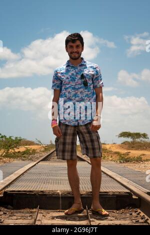 Straight train tracks in perspective into the distance, with selective ...