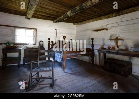 Interior of preserved slave quarters shack at cotton plantation at ...