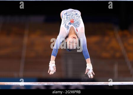 Fan Yilin, of China, performs in the uneven bars event of the women's ...