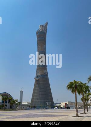The Torch Tower in Doha Sport City Complex at sunset next to Aspire ...