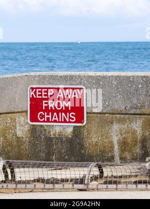 'Keep away from Chains' sign on the Poole Harbour Hampshire Dorset ...