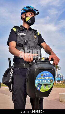 Police Officer Patrols on a Segway Stock Photo - Alamy