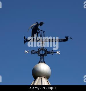 Weathervane bearing the words, "Lest time bails you out" above a ...