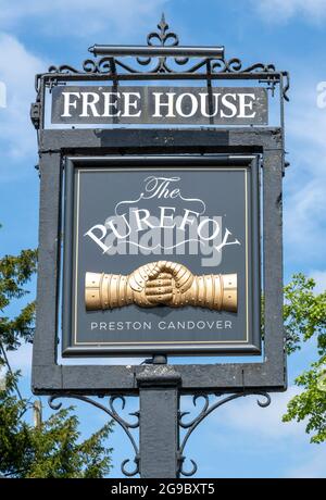 Traditional hanging pub sign at The Purefoy public house, Preston ...