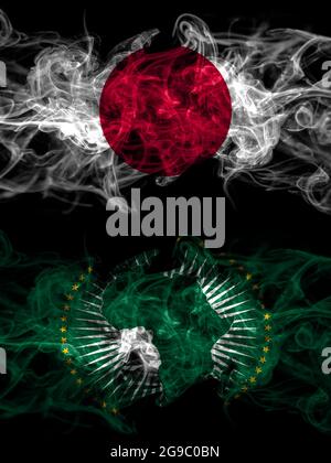 African Union and Japan, national flag from textile. Africa continent ...
