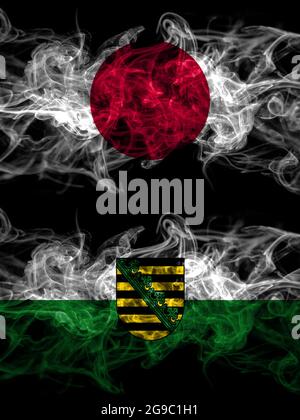 Smoke flags of Japan, Japanese and Saxony Anhalt, state Stock Photo - Alamy