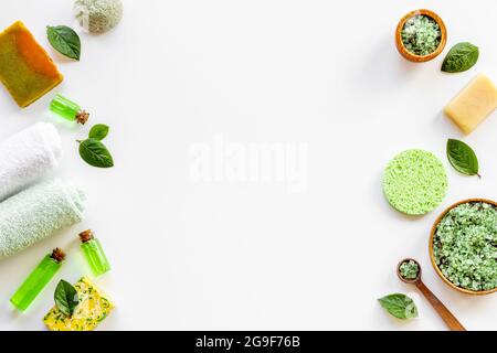 Frame of tea tree cosmetics with essential oil and green leaves Stock ...