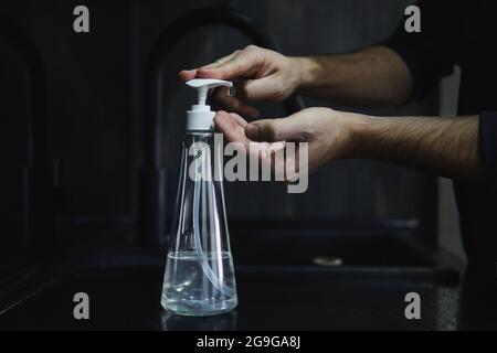 Hands desinfection dispenser in medical center. Antibacterial procedure ...