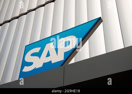 SAP trademark logo on metal wall of modern building. SAP SE is a German ...