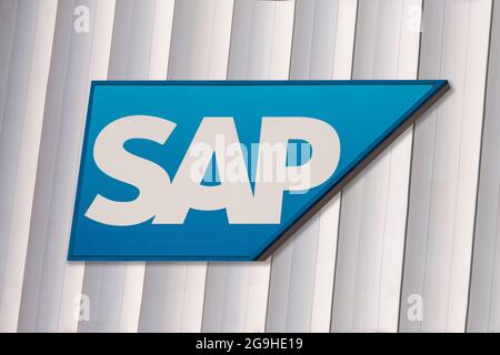 SAP trademark logo on metal wall of modern building. SAP SE is a German ...