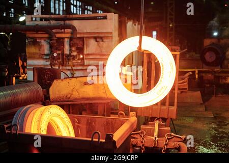men at the factory in helmets metallurgy Stock Photo - Alamy