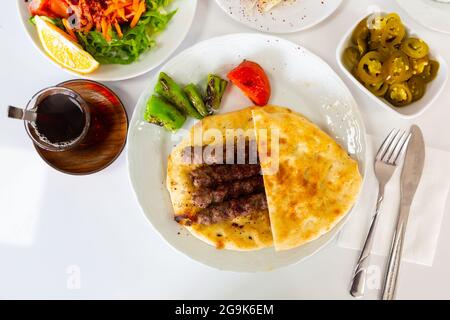 A traditional Turkish dish called Shish Kefte (Isparta sis Kofte Stock ...