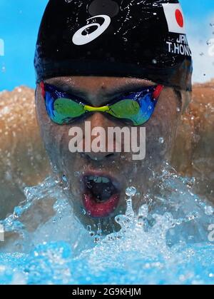 Tomoru Honda of Japan competes in the 200m Butterfly Men Final during ...