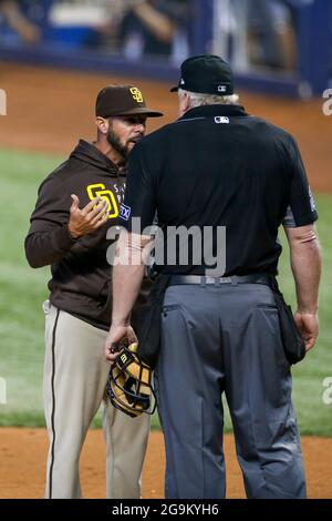 Home plate umpire Bill Miller (26) in action during a baseball game ...