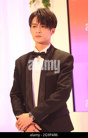 Chinese actor and singer Tan Jianci arrives at a Beijing airport after landing in Beijing, China ...