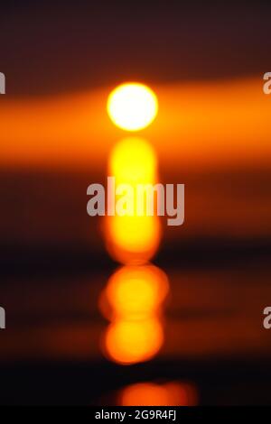 orange sun out of focus Stock Photo - Alamy