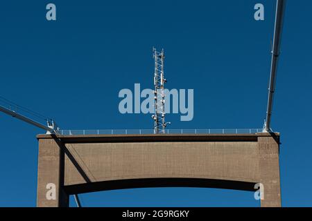 Communications pylon on the top of a suspension bridge tower Stock ...